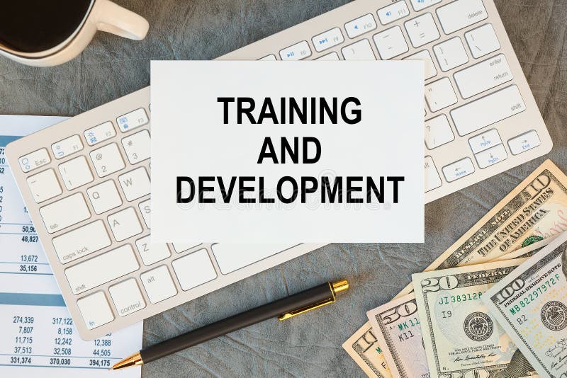 Training and Development is Written in a Document on the Office Desk ...