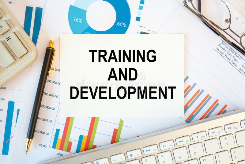 Training and Development is Written in a Document on the Office Desk ...