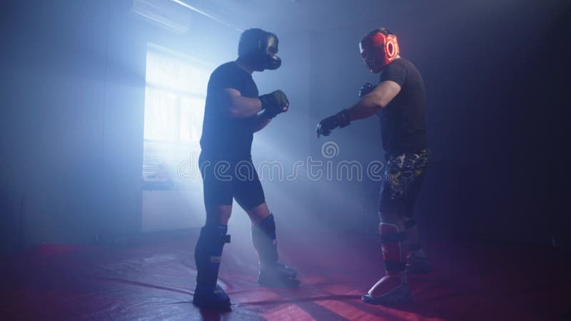 Training Fight of Two Kickboxers in the Gym on the Mat. Stock Footage ...