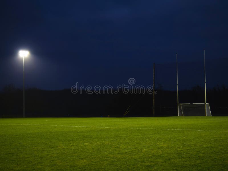 Training Ground with Grass Illuminated by Modern Powerful LED Lights ...