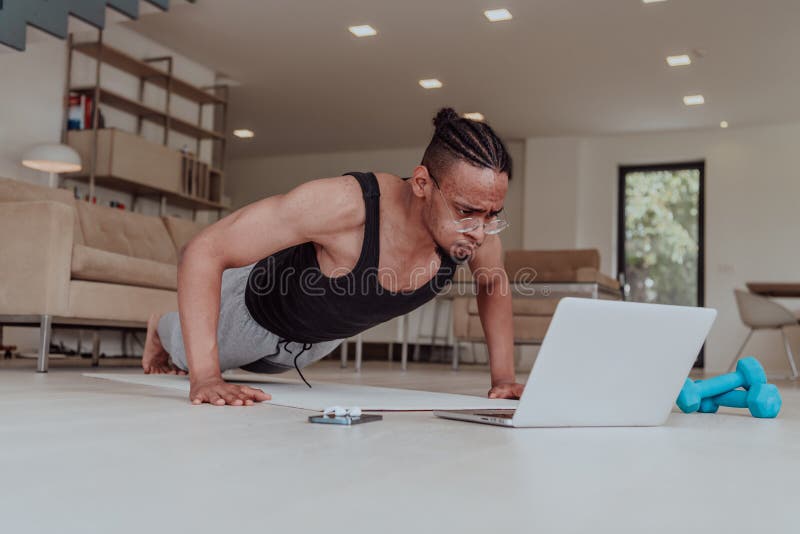 Training at Home. Sporty Man Doing Training while Watching Online ...
