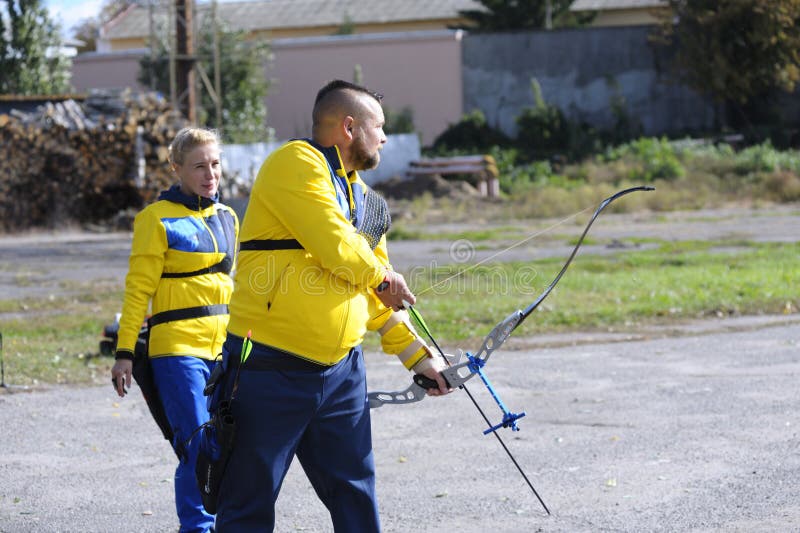 Training. Man Archer Aiming a Bow on an Archery Shooting Range. Kyiv ...