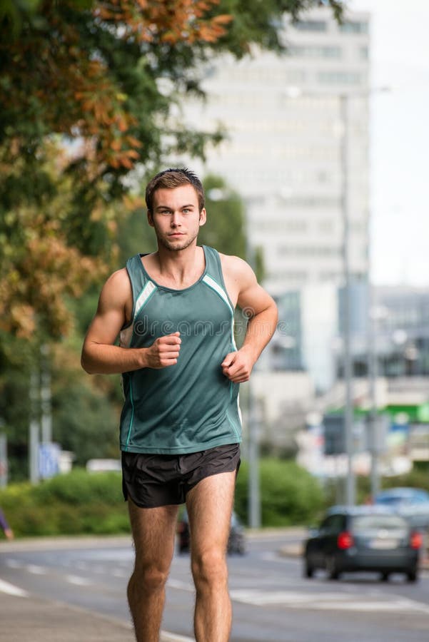 Runner Man Running at Rome Marathon Near Colosseum Stock Photo - Image ...