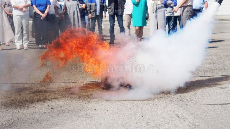 Training Population and Workers To Extinguish Fire. Good Example Stock ...