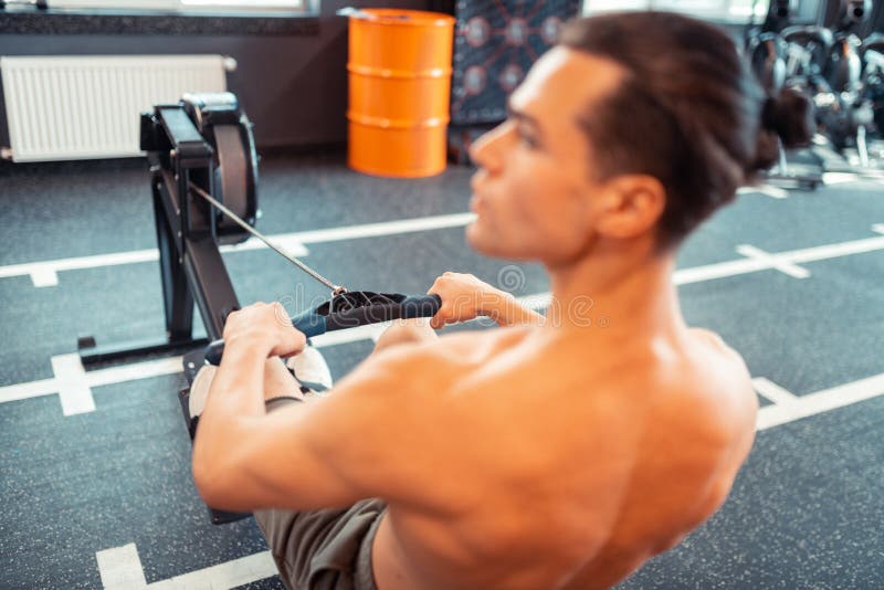 Sport Exercise Machine Being Used in the Gym Stock Photo - Image of ...