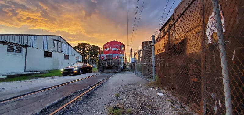 Trains and Cars stock image. Image of mustang, sunset - 163309503