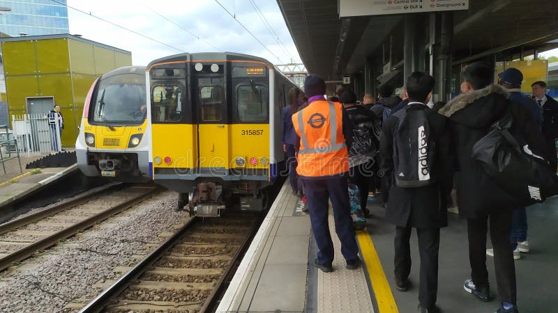 Trains at Train Station with Passenger Boarding in Editorial Image ...