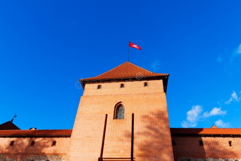 Trakai, Lithuania: Tower of Castle with National Flag Stock Photo ...