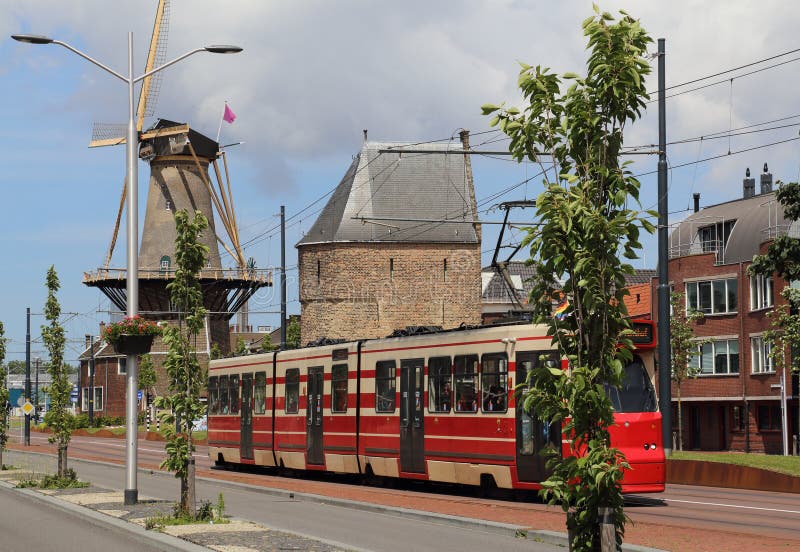 Tram in Delft, Holland stock photo. Image of pavement - 170231060