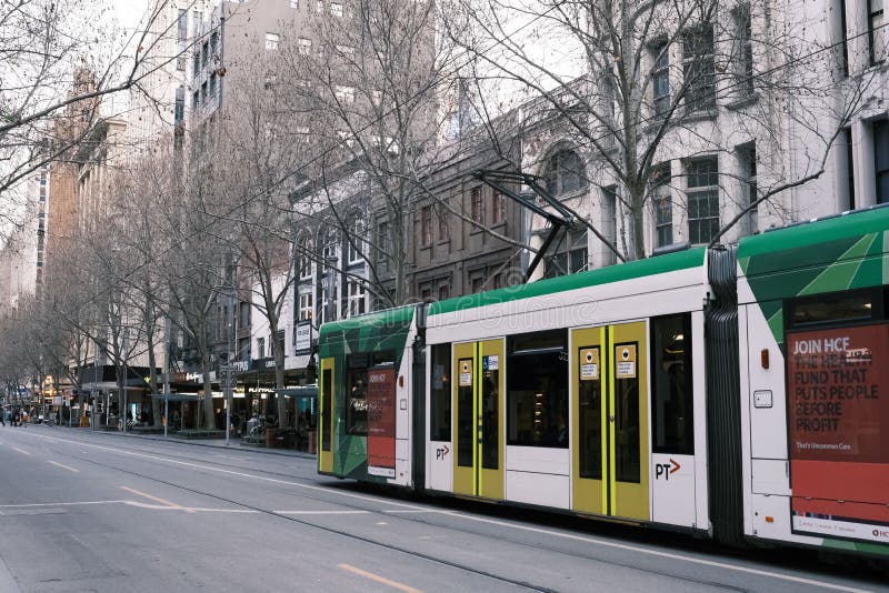 Tram moving in the street editorial photography. Image of transport ...
