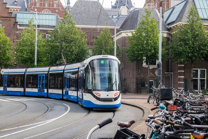 A Tram, a Public Transport Vehicle, in Motion on Rails Stock Photo ...