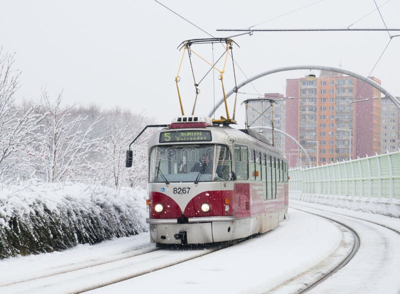 Tram in snowfall editorial stock photo. Image of electric - 136404528