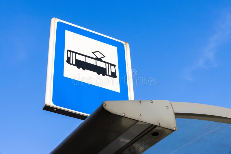 Tram stop sign stock image. Image of pedestrians, symbol - 327692447