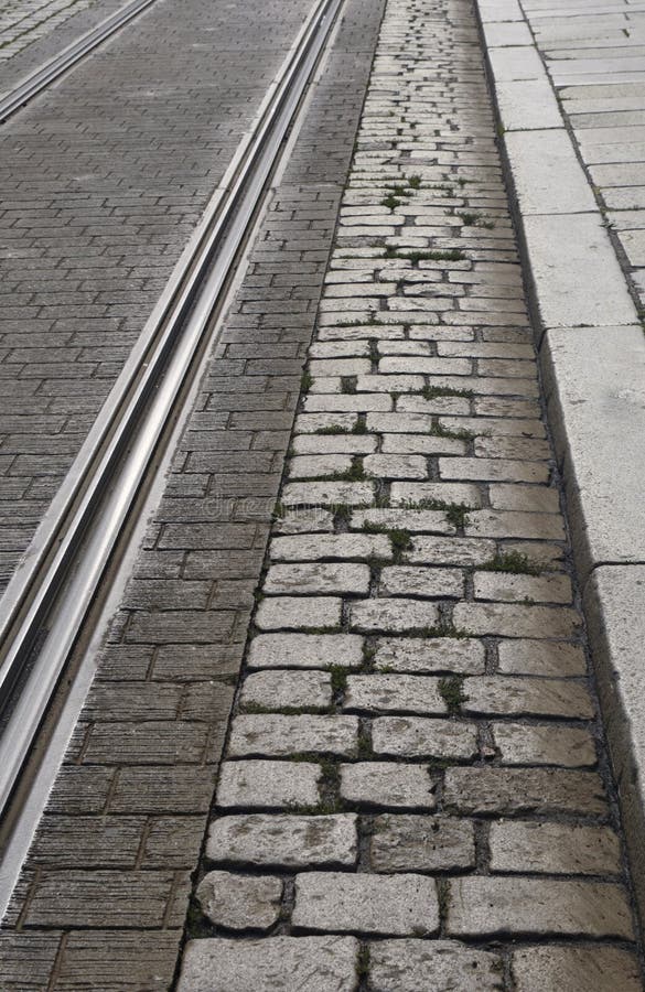 Tram tracks and sidewalk stock image. Image of cobble - 24493585
