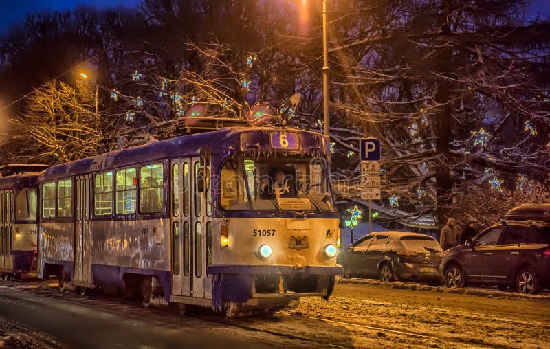Tram in winter in Riga editorial stock image. Image of equipment - 83740354