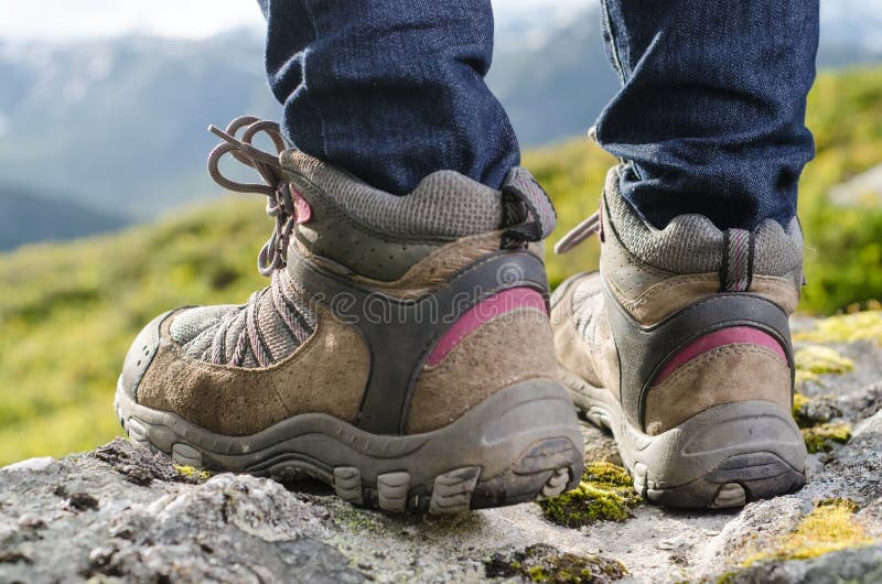 Tramping boots on a stone stock image. Image of climb - 27028463