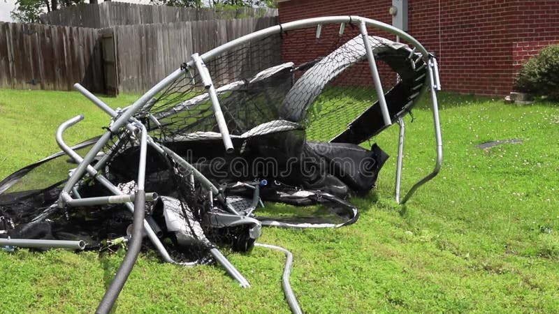 Storm Damage Tree and Trampoline Stock Photo - Image of service, advice ...