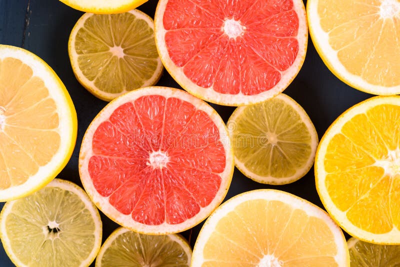 Tranches D'agrumes D'orange, De Pamplemousse Et De Citron Image stock ...