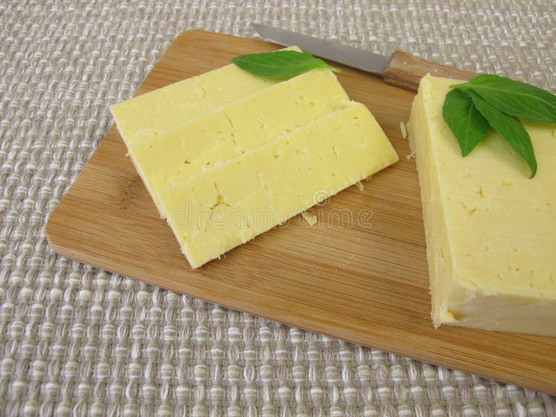Tranches De Fromage De Cheddar Photo stock - Image du ingrédient, lait ...