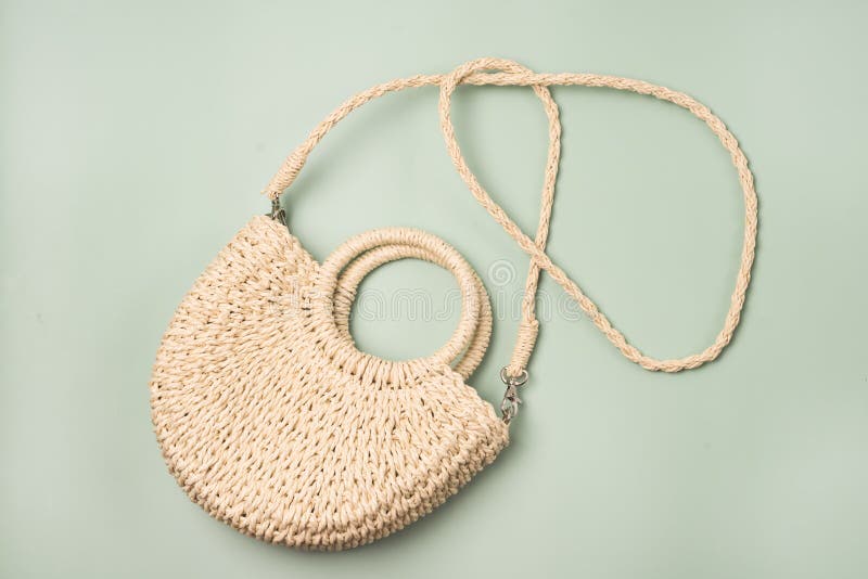 Trandy Straw Female Bag and Sun Glasses on Light Green Background Top ...