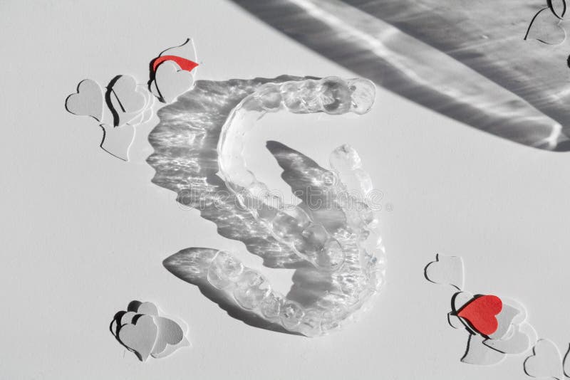 Tranparent Braces. Invisible Aligners with Paper Hearts Stock Image ...