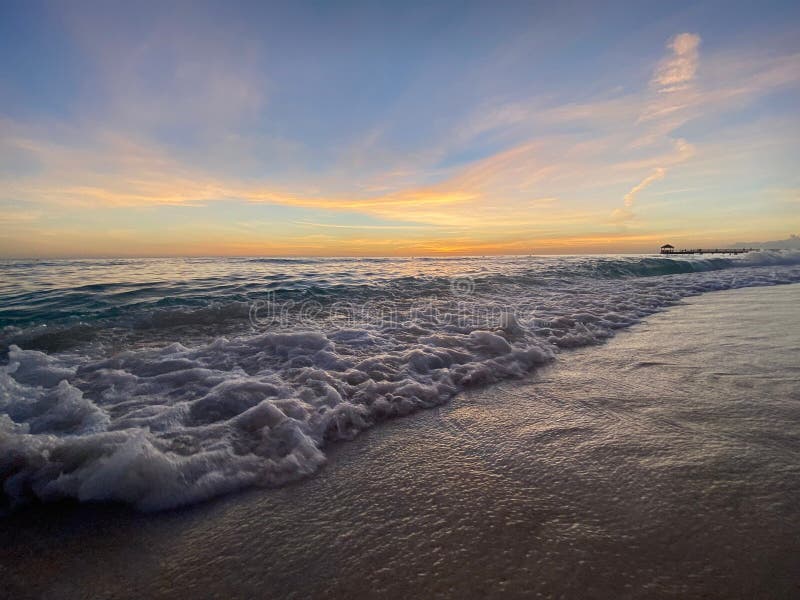 Beachscape at sunset stock image. Image of tracks, outcrop - 11339089