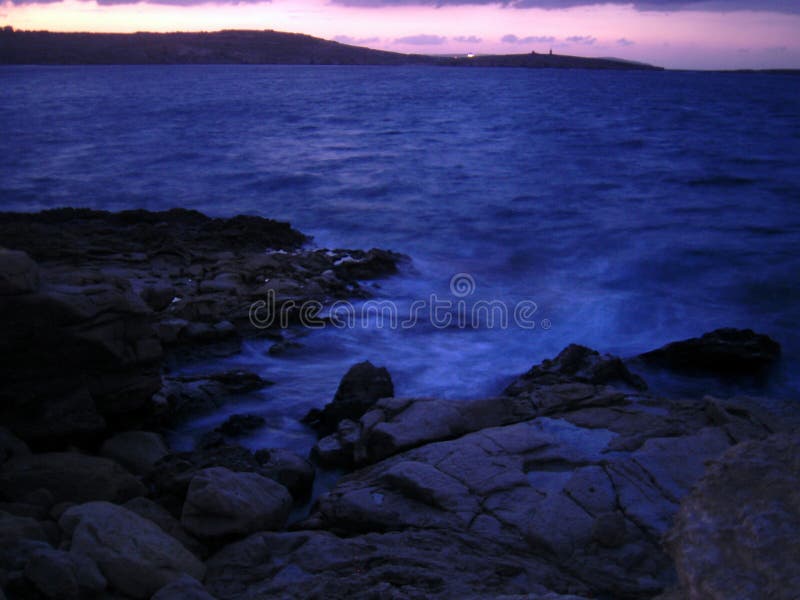 Sunset at Qawra stock image. Image of scenics, water - 286324583