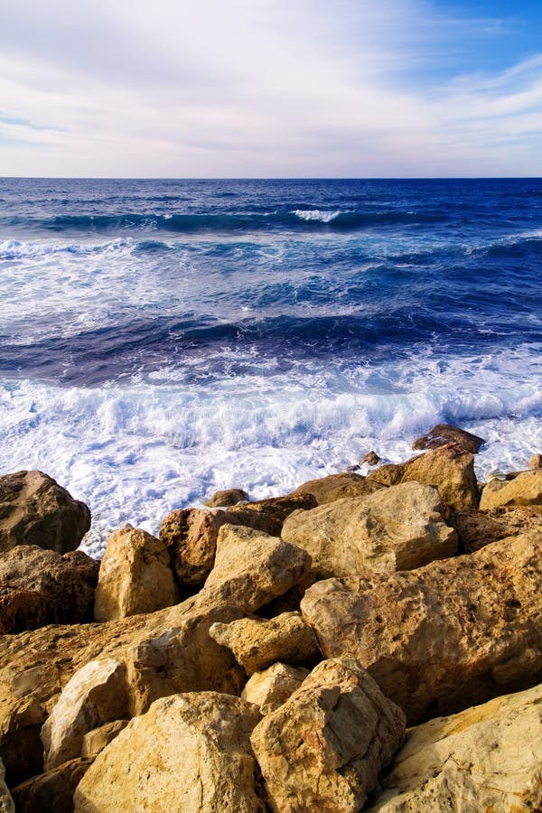 Sea waves and rocks stock photo. Image of picturesque - 23779776