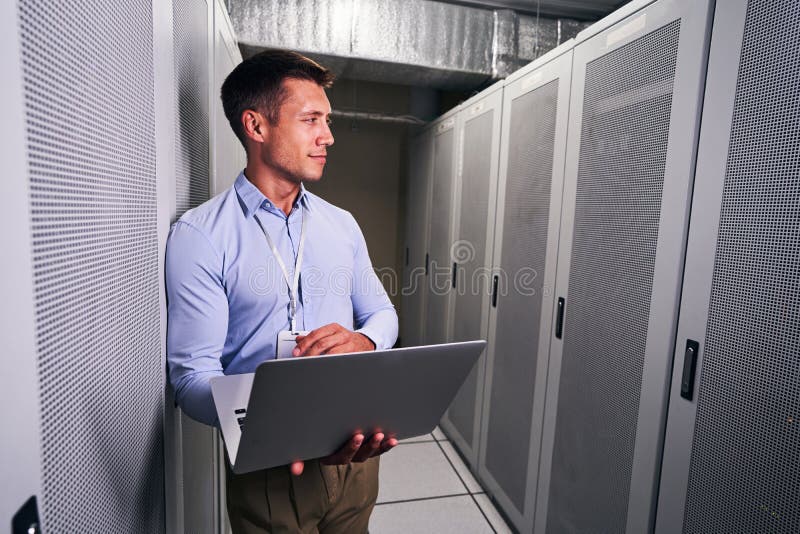 Male Hacker in Hoodie among Server Racks Stock Photo - Image of data ...