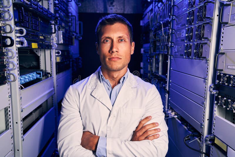Calm System Administrator Standing in Server Room Stock Image - Image ...