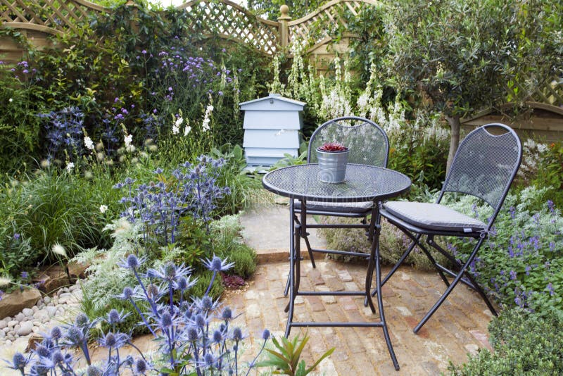 Tranquil garden landscape stock image. Image of flowers - 77739159