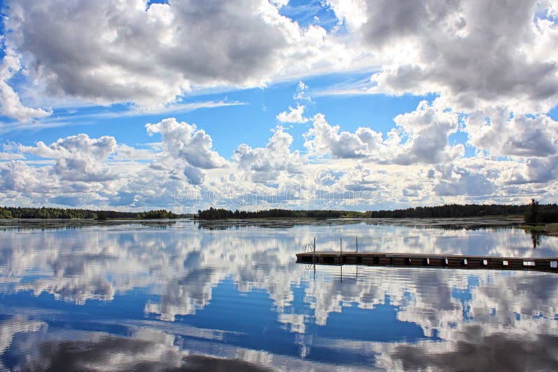 Clouds Reflection on the Water Stock Image - Image of clouds, scenery ...