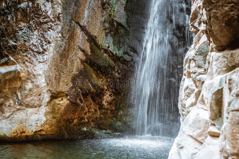 Tranquil Millomeris Waterfall Cascading Down Mossy Rocks. Cyprus Stock ...