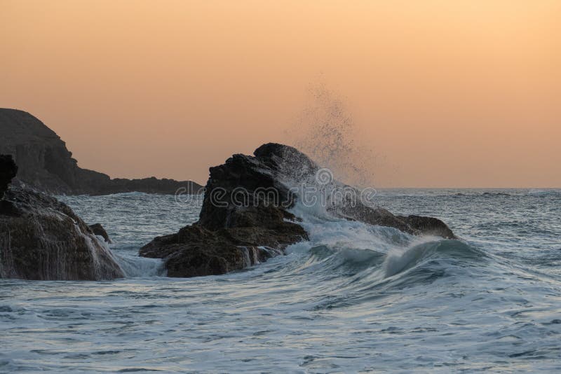 Tranquil Ocean Landscape Featuring the Sun Setting Over the Horizon ...