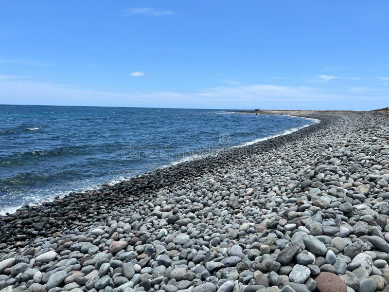Tranquil Ocean Shore Featuring a Lot of Pebbles Stock Image - Image of ...