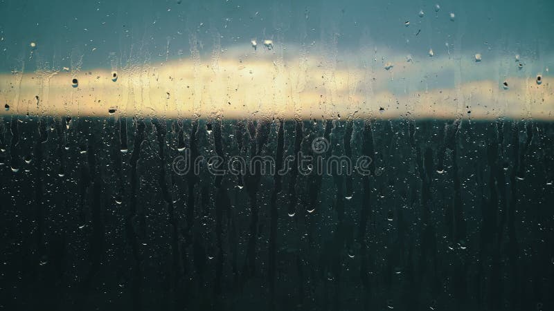 Tranquil Raindrops on Window Stock Video - Video of dusk, golden: 314262207
