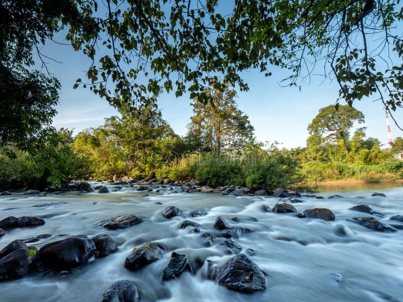 The Tranquil River Flow stock photo. Image of surface - 375207054