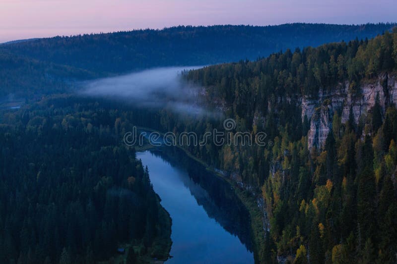 The Tranquil River Winds through a Vibrant Valley Surrounded by Dense ...