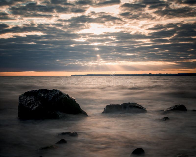 Layers of Clouds in Front of the Sun after Storm Stock Image - Image of ...