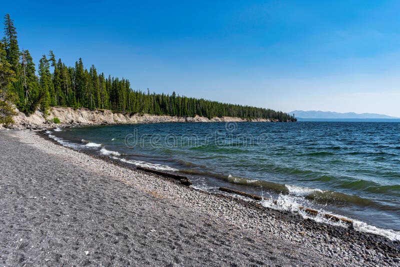 Tranquil Scenery of a Rocky Lake Shore Stock Image - Image of water ...