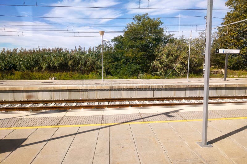 Tranquil Train Platform in Rural Landscape on a Sunny Day Stock Photo ...