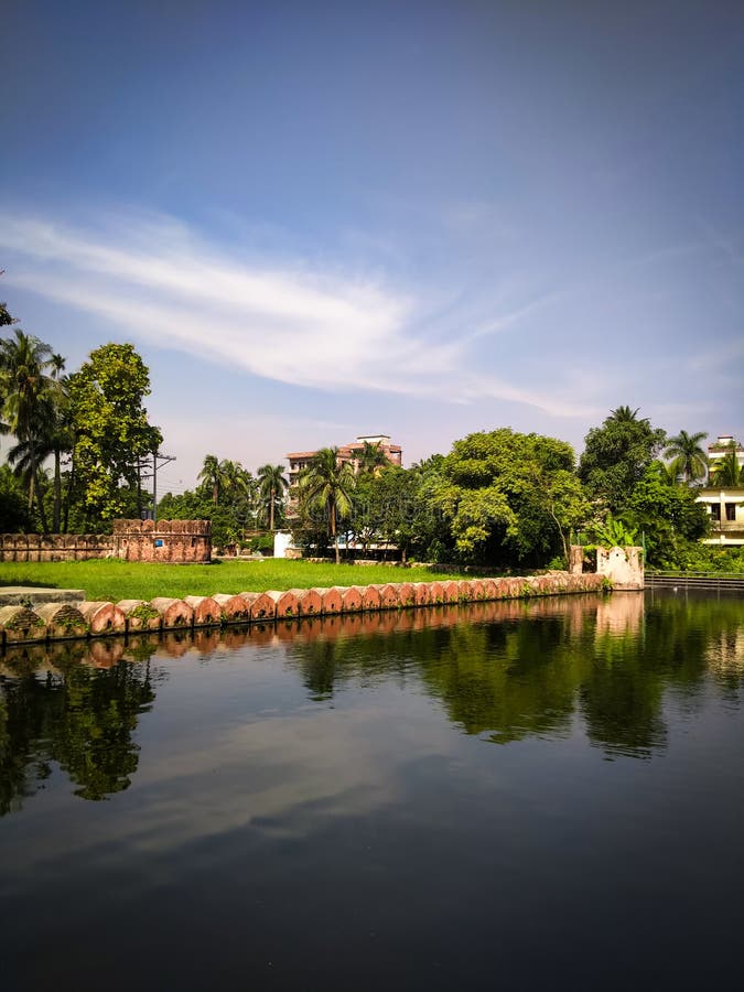 Serene Water Feature Reflecting Ancient Architecture Stock Photo ...