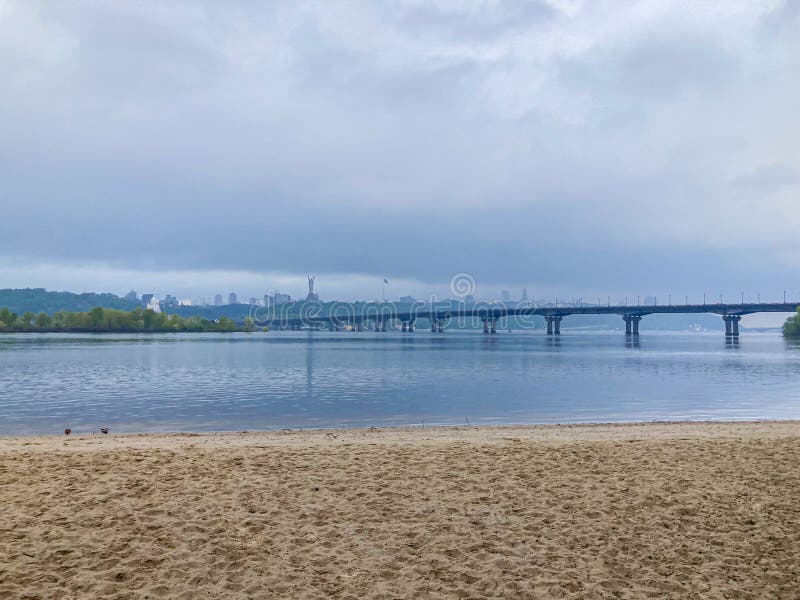 A Tranquil Waterfront Scene with a Reflective Body of Water ...