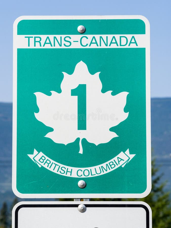 Trans Canada Highway With Sign Stock Photo - Image of north, peaks ...