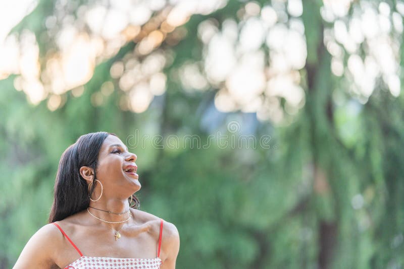 Trans Woman Looking Up while Laughing in the Nature Stock Image - Image ...