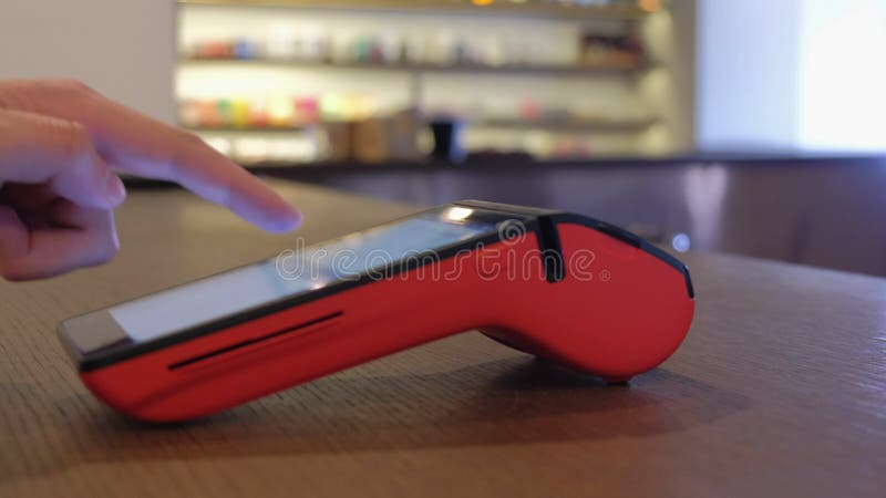 Transaction in the Store, the Client Pays for the Purchase by Card ...