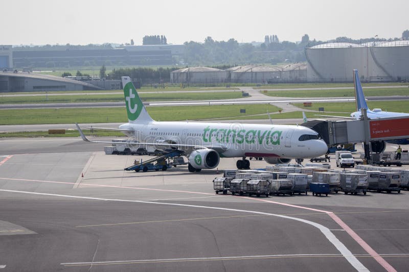 Transavia Airplane with Jet Bridge at Schiphol the Netherlands 29-8 ...
