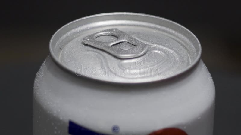 Carbonated Cola Drink in Glass with Ice in Front of Burning Fire in ...
