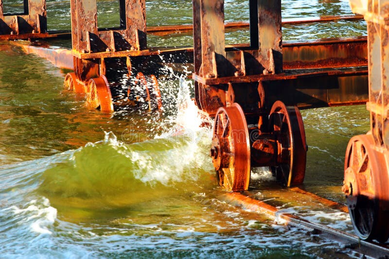 Transfer System of Shiplift at an Old Shipyard. Rusty Steel Wheels in ...