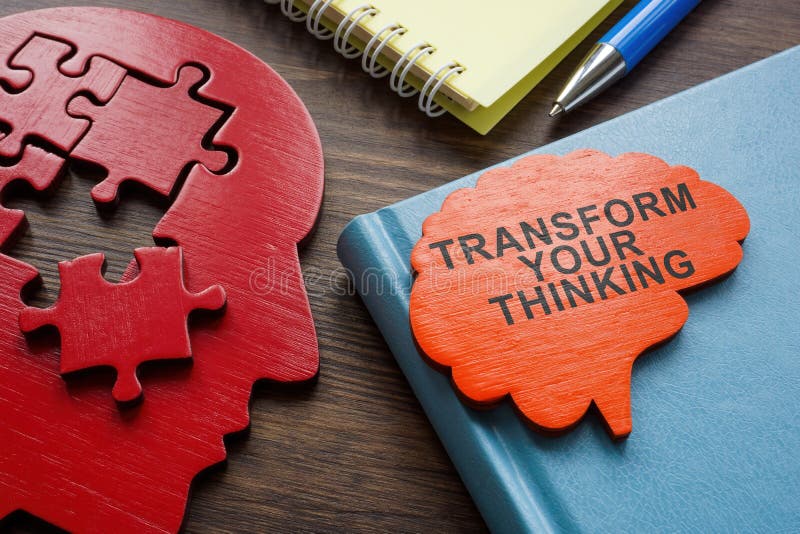 Transform Your Thinking Sign on the Brain and Puzzle. Stock Image ...